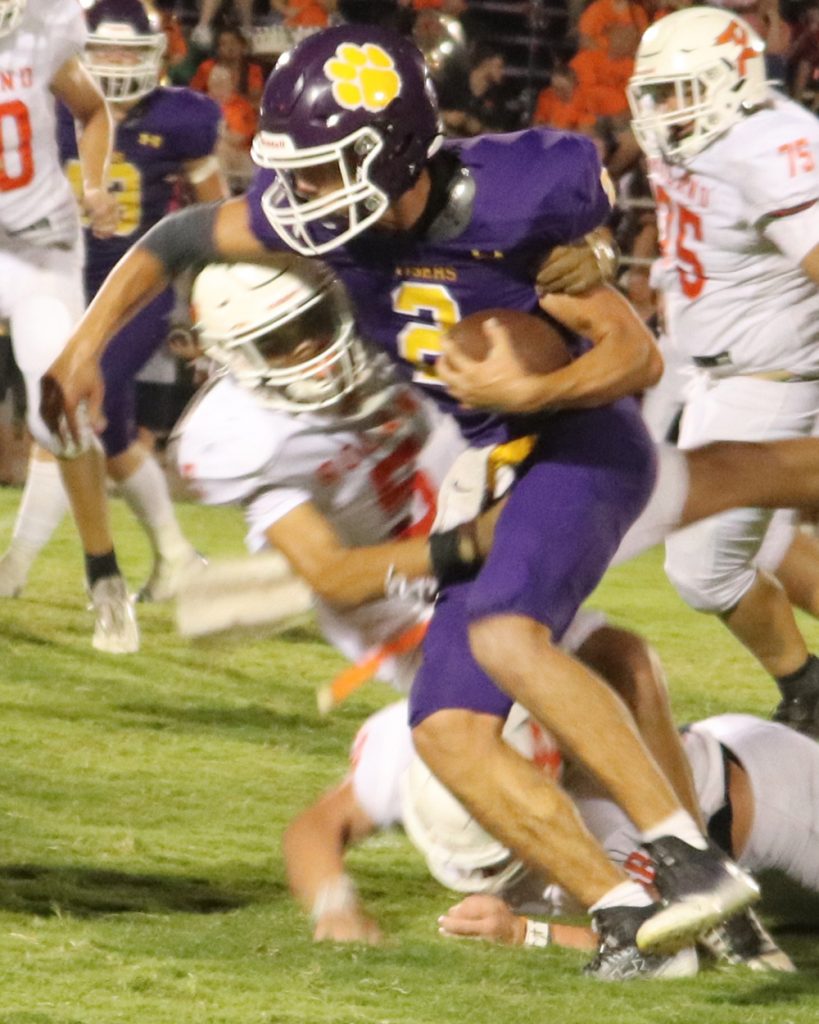 Tigers get first win of season, knock off Roland Rangers - Sequoyah County Times